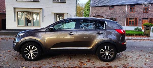 Grey Kia Sportage 2011 in Kaunas, with an engine capacity of 1.60 L and mileage of 160 thousand km for 6500 €, photo 3 on AUTOMOTO.COM.LV