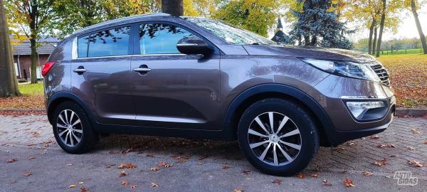 Grey Kia Sportage 2011 in Kaunas, with an engine capacity of 1.60 L and mileage of 160 thousand km for 6500 €, photo 6 on AUTOMOTO.COM.LV