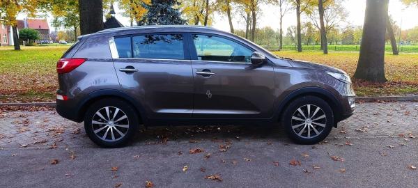 Grey Kia Sportage 2011 in Kaunas, with an engine capacity of 1.60 L and mileage of 160 thousand km for 6500 €, photo 8 on AUTOMOTO.COM.LV