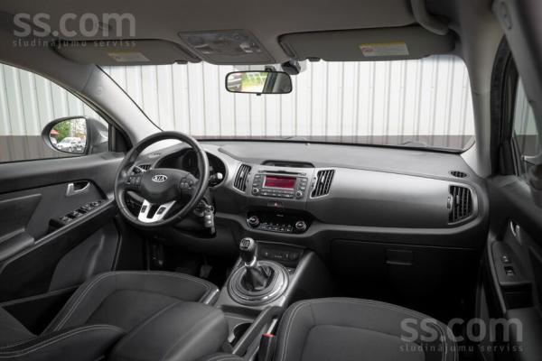 Grey Kia Sportage 2011 in Talsi, with an engine capacity of 1.70 L and mileage of 229 thousand km for 4950 €, photo 8 on AUTOMOTO.COM.LV