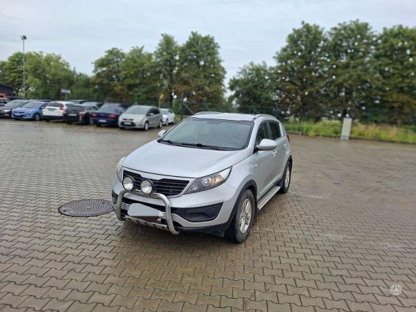 Grey Kia Sportage 2011 in Kaunas, with an engine capacity of 1.69 L and mileage of 325 thousand km for 4750 €, photo 3 on AUTOMOTO.COM.LV