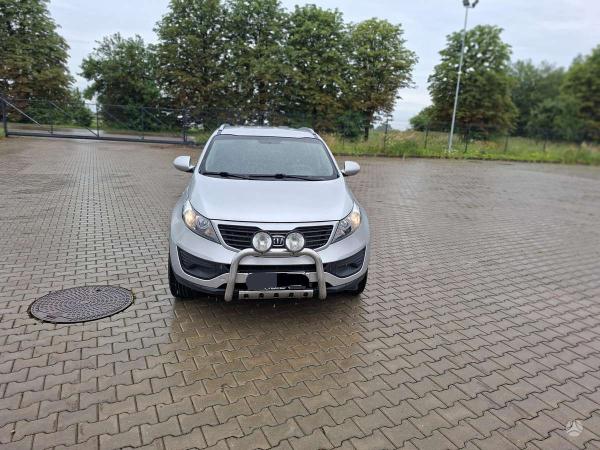 Grey Kia Sportage 2011 in Kaunas, with an engine capacity of 1.69 L and mileage of 325 thousand km for 4750 €, photo 4 on AUTOMOTO.COM.LV