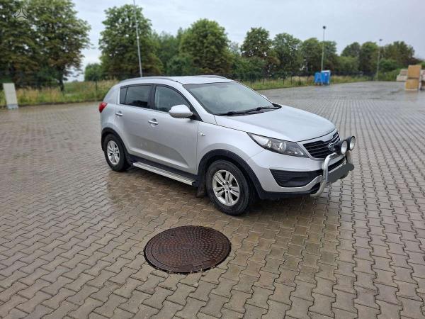 Grey Kia Sportage 2011 in Kaunas, with an engine capacity of 1.69 L and mileage of 325 thousand km for 4750 €, photo 5 on AUTOMOTO.COM.LV