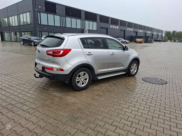 Grey Kia Sportage 2011 in Kaunas, with an engine capacity of 1.69 L and mileage of 325 thousand km for 4750 €, photo 7 on AUTOMOTO.COM.LV