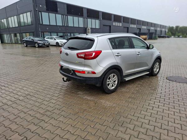 Grey Kia Sportage 2011 in Kaunas, with an engine capacity of 1.69 L and mileage of 325 thousand km for 4750 €, photo 8 on AUTOMOTO.COM.LV