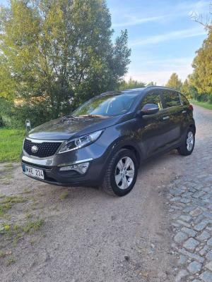 Grey Kia Sportage 2011 in Silute, with an engine capacity of 1.70 L and mileage of 306 thousand km for 6200 €, photo  on AUTOMOTO.COM.LV