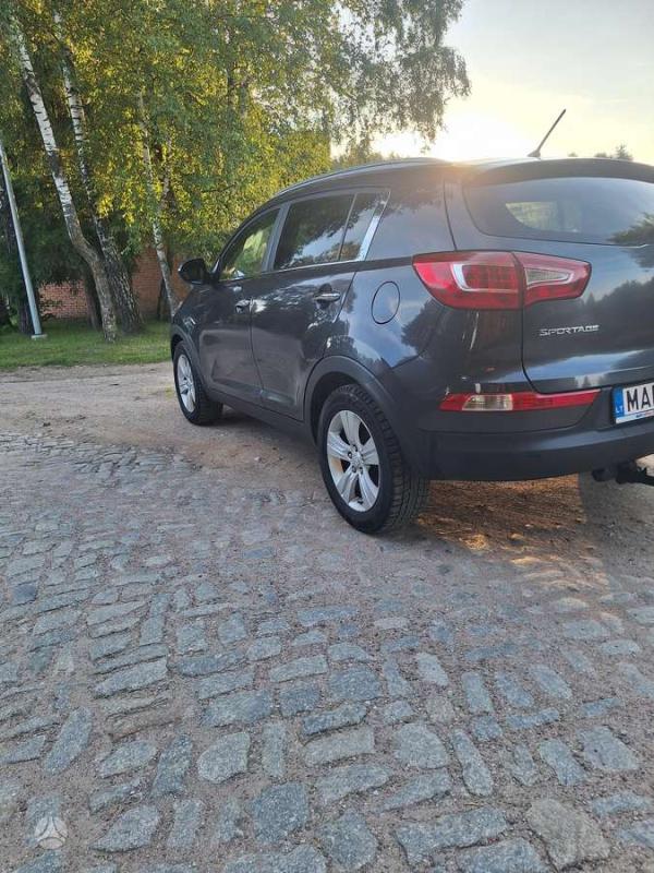 Grey Kia Sportage 2011 in Silute, with an engine capacity of 1.70 L and mileage of 306 thousand km for 6200 €, photo 3 on AUTOMOTO.COM.LV