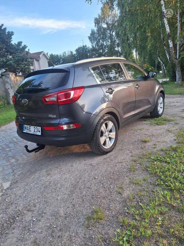 Grey Kia Sportage 2011 in Silute, with an engine capacity of 1.70 L and mileage of 306 thousand km for 6200 €, photo 7 on AUTOMOTO.COM.LV