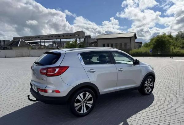 Pelēks Kia Sportage 2011 Telšiai, ar dzinēja tilpumu 1.70 L un nobraukumu 229 tūkst. km par 7190 €, foto 9 vietnē AUTOMOTO.COM.LV