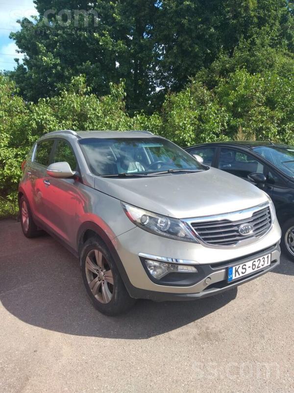 Pelēks Kia Sportage 2011 Rīga, ar dzinēja tilpumu 1.70 L un nobraukumu 251 tūkst. km par 2000 €, foto 2 vietnē AUTOMOTO.COM.LV