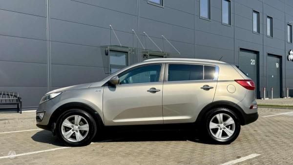 Grey Kia Sportage 2011 in Vilnius, with an engine capacity of 1.99 L and mileage of 340 thousand km for 4990 €, photo 6 on AUTOMOTO.COM.LV