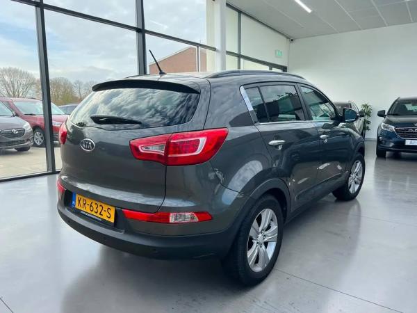 Grey Kia Sportage 2011 in Jurmala, with an engine capacity of 1.60 L and mileage of 220 thousand km for 7250 €, photo 4 on AUTOMOTO.COM.LV