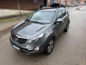 Grey Kia Sportage 2011 in Alytus, with an engine capacity of 1.69 L and mileage of 208 thousand km for 5700 €, photo  on AUTOMOTO.COM.LV