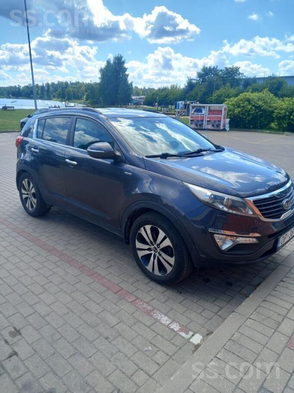 Grey Kia Sportage 2011 in Jelgava, with an engine capacity of 2.00 L and mileage of 310 thousand km for 5500 €, photo 3 on AUTOMOTO.COM.LV