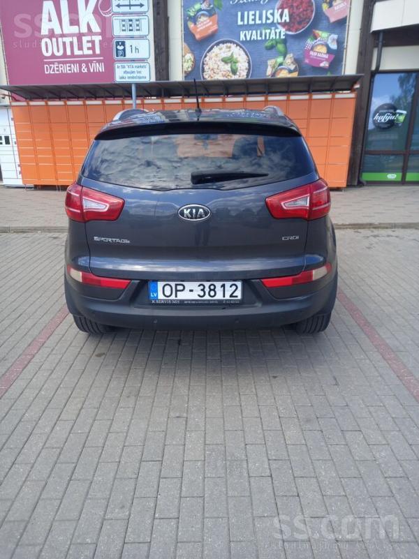 Grey Kia Sportage 2011 in Jelgava, with an engine capacity of 2.00 L and mileage of 310 thousand km for 5500 €, photo 5 on AUTOMOTO.COM.LV