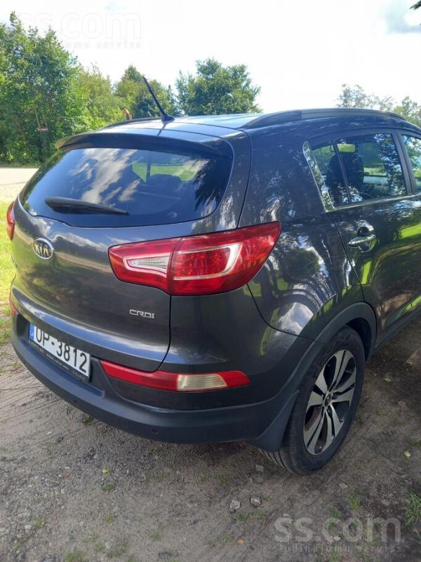 Grey Kia Sportage 2011 in Jelgava, with an engine capacity of 2.00 L and mileage of 310 thousand km for 5500 €, photo 8 on AUTOMOTO.COM.LV