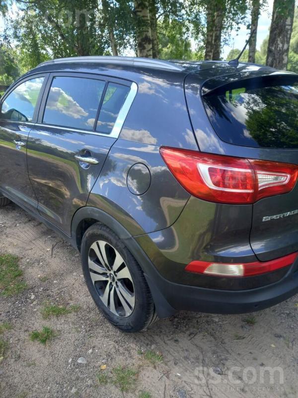 Grey Kia Sportage 2011 in Jelgava, with an engine capacity of 2.00 L and mileage of 310 thousand km for 5500 €, photo 9 on AUTOMOTO.COM.LV