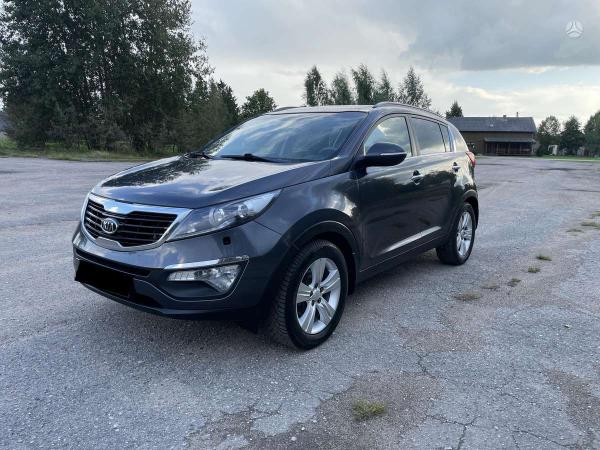 Grey Kia Sportage 2011 in Ukmerge, with an engine capacity of 1.69 L and mileage of 260 thousand km for 5500 €, photo 1 on AUTOMOTO.COM.LV