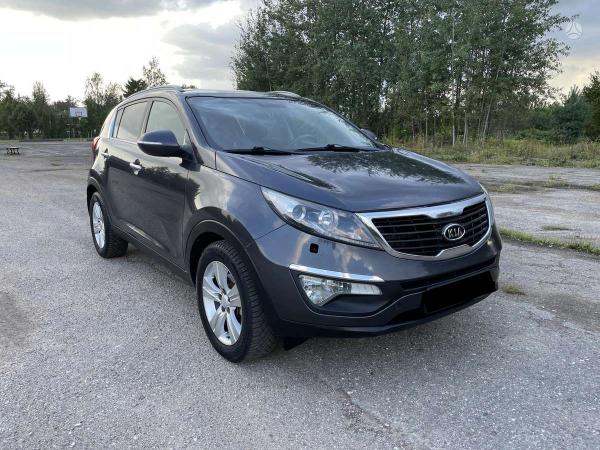 Grey Kia Sportage 2011 in Ukmerge, with an engine capacity of 1.69 L and mileage of 260 thousand km for 5500 €, photo 4 on AUTOMOTO.COM.LV