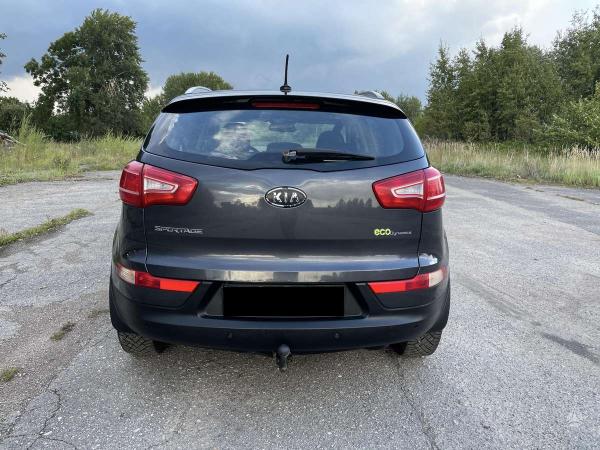 Grey Kia Sportage 2011 in Ukmerge, with an engine capacity of 1.69 L and mileage of 260 thousand km for 5500 €, photo 7 on AUTOMOTO.COM.LV