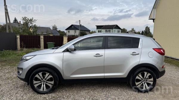 Grey Kia Sportage 2011 in Rezekne, with an engine capacity of 1.70 L and mileage of 323 thousand km for 4950 €, photo 3 on AUTOMOTO.COM.LV