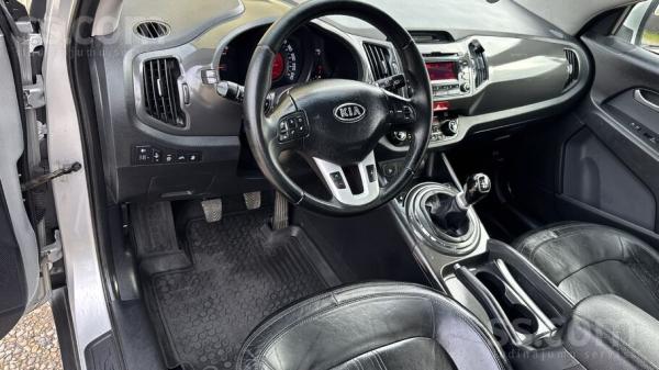 Grey Kia Sportage 2011 in Rezekne, with an engine capacity of 1.70 L and mileage of 323 thousand km for 4950 €, photo 9 on AUTOMOTO.COM.LV