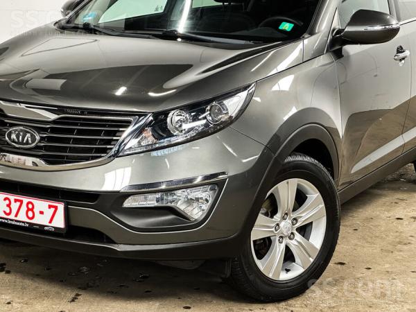 Grey Kia Sportage 2011 in Jurmala, with an engine capacity of 1.60 L and mileage of 220 thousand km for 7450 €, photo 3 on AUTOMOTO.COM.LV