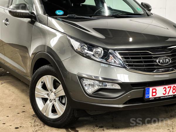 Grey Kia Sportage 2011 in Jurmala, with an engine capacity of 1.60 L and mileage of 220 thousand km for 7450 €, photo 5 on AUTOMOTO.COM.LV
