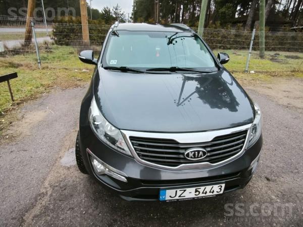 Grey Kia Sportage 2012 in Riga, with an engine capacity of 1.70 L and mileage of 254 thousand km for 5200 €, photo 3 on AUTOMOTO.COM.LV