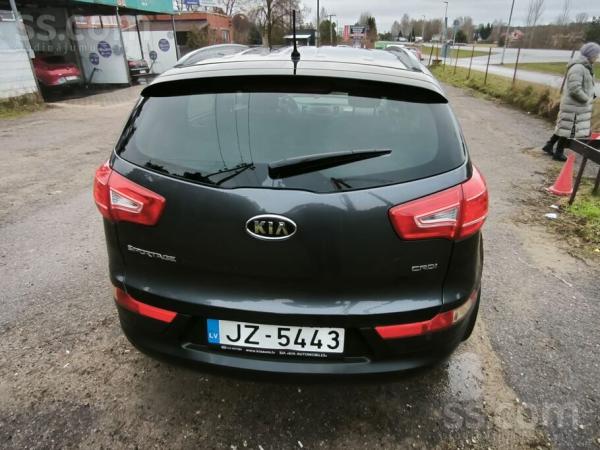 Grey Kia Sportage 2012 in Riga, with an engine capacity of 1.70 L and mileage of 254 thousand km for 5200 €, photo 4 on AUTOMOTO.COM.LV