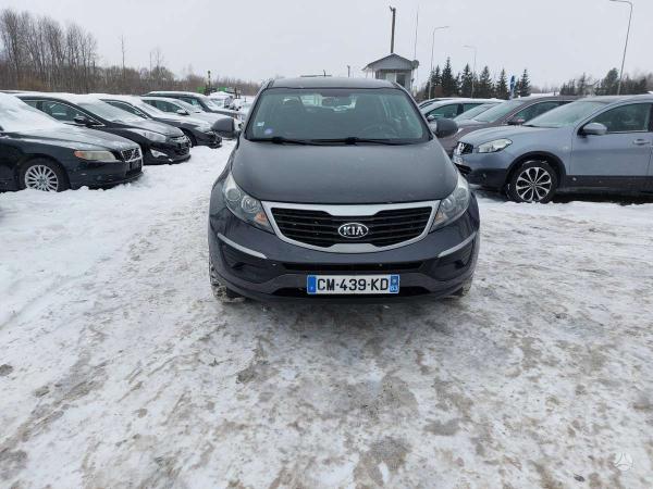 Grey Kia Sportage 2012 in Utena, with an engine capacity of 1.59 L and mileage of 200 thousand km for 5700 €, photo 1 on AUTOMOTO.COM.LV