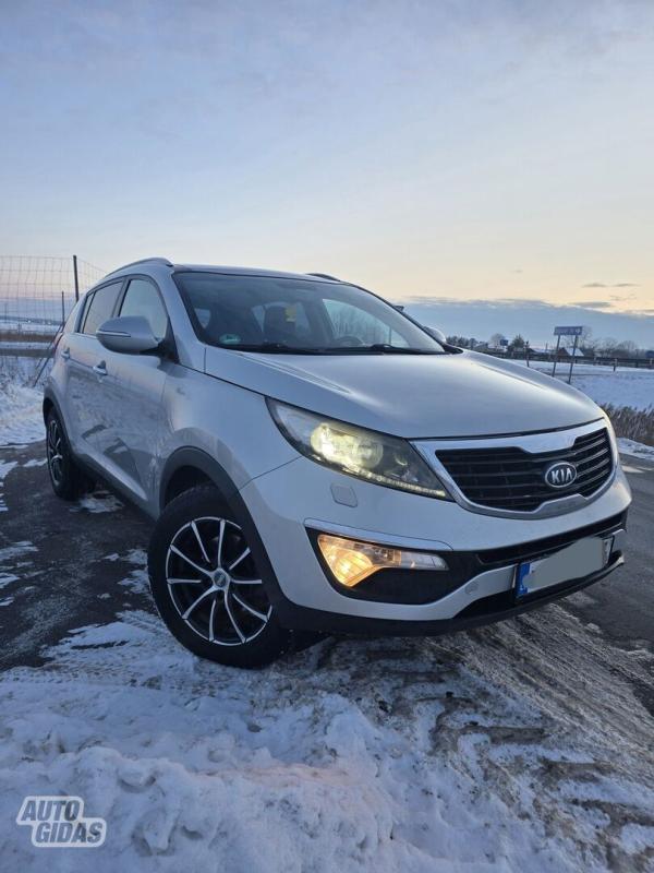 Grey Kia Sportage 2012 in Panevezys, with an engine capacity of 2.00 L and mileage of 289 thousand km for 6500 €, photo 2 on AUTOMOTO.COM.LV