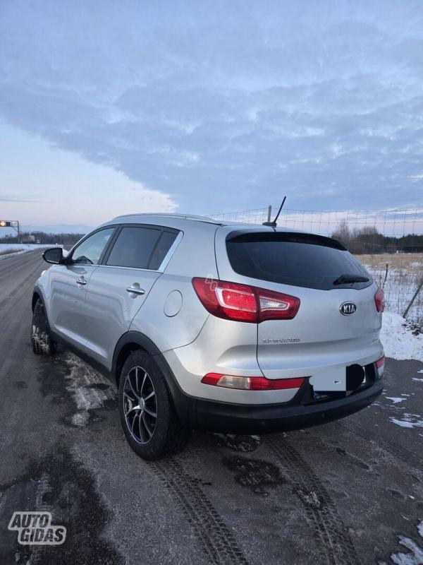 Grey Kia Sportage 2012 in Panevezys, with an engine capacity of 2.00 L and mileage of 289 thousand km for 6500 €, photo 3 on AUTOMOTO.COM.LV