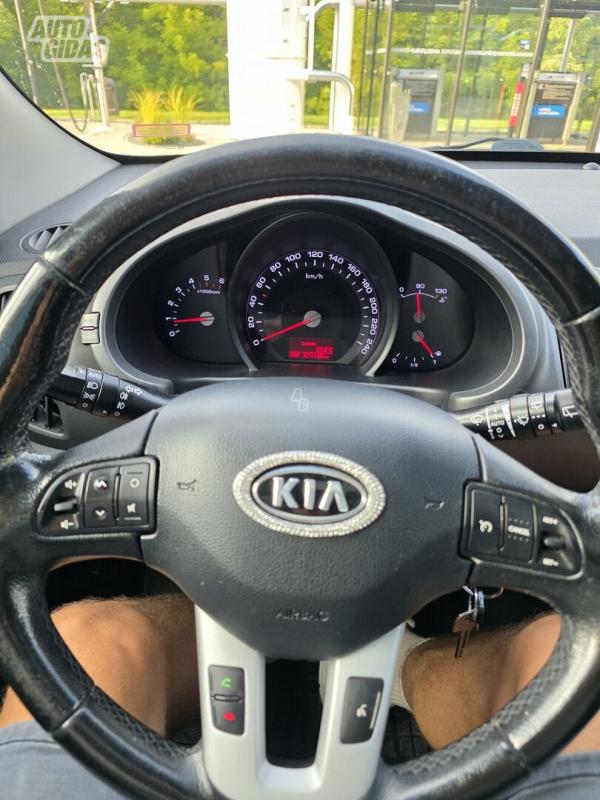 Grey Kia Sportage 2012 in Panevezys, with an engine capacity of 2.00 L and mileage of 289 thousand km for 6500 €, photo 6 on AUTOMOTO.COM.LV