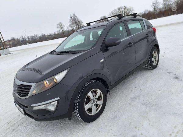 Grey Kia Sportage 2012 in Marijampole, with an engine capacity of 1.59 L and mileage of 261 thousand km for 4399 €, photo 1 on AUTOMOTO.COM.LV