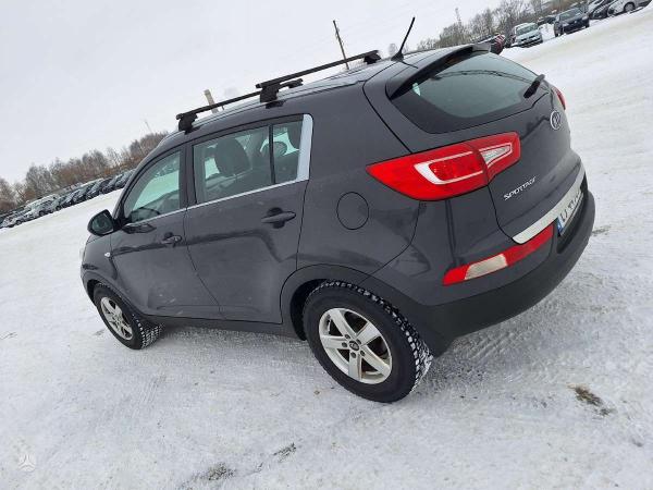 Grey Kia Sportage 2012 in Marijampole, with an engine capacity of 1.59 L and mileage of 261 thousand km for 4399 €, photo 5 on AUTOMOTO.COM.LV