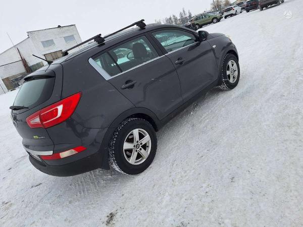 Grey Kia Sportage 2012 in Marijampole, with an engine capacity of 1.59 L and mileage of 261 thousand km for 4399 €, photo 7 on AUTOMOTO.COM.LV