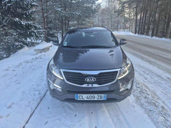 Grey Kia Sportage 2012 in Taurage, with an engine capacity of 2.00 L and mileage of 255 thousand km for 6400 €, photo 2 on AUTOMOTO.COM.LV