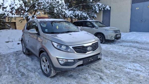 Grey Kia Sportage 2012 in Vilnius, with an engine capacity of 1.59 L and mileage of 166 thousand km for 6150 €, photo 1 on AUTOMOTO.COM.LV