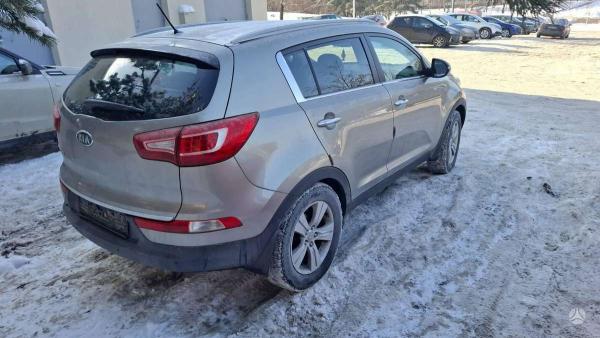 Grey Kia Sportage 2012 in Vilnius, with an engine capacity of 1.59 L and mileage of 166 thousand km for 6150 €, photo 2 on AUTOMOTO.COM.LV