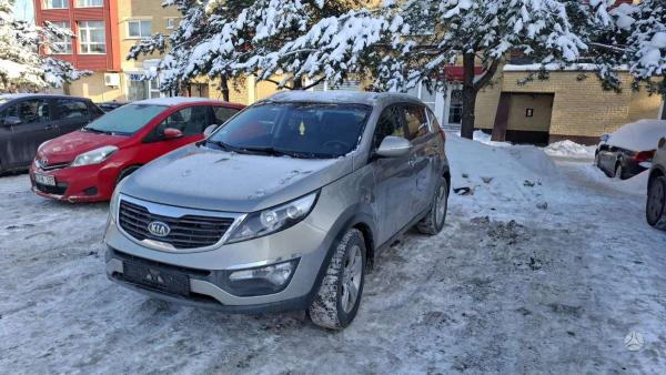 Grey Kia Sportage 2012 in Vilnius, with an engine capacity of 1.59 L and mileage of 166 thousand km for 6150 €, photo 3 on AUTOMOTO.COM.LV