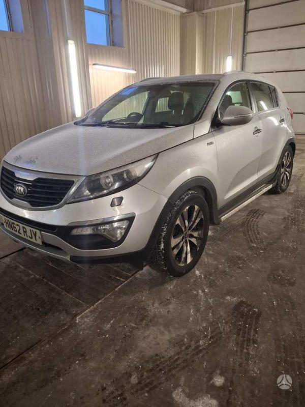 Grey Kia Sportage 2012 in Alytus, with an engine capacity of 2.00 L and mileage of 145 thousand km for 2500 €, photo 1 on AUTOMOTO.COM.LV