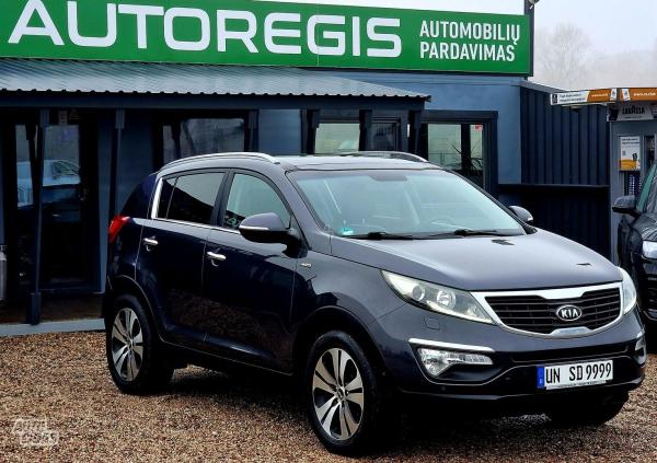Grey Kia Sportage 2012 in Kretinga, with an engine capacity of 2.00 L and mileage of 234 thousand km for 8600 €, photo 1 on AUTOMOTO.COM.LV