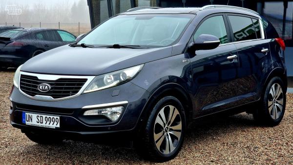 Grey Kia Sportage 2012 in Kretinga, with an engine capacity of 2.00 L and mileage of 234 thousand km for 8600 €, photo 4 on AUTOMOTO.COM.LV