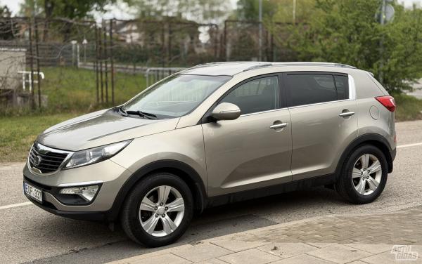 Grey Kia Sportage 2012 in Vilnius, with an engine capacity of 1.70 L and mileage of 317 thousand km for 5650 €, photo 7 on AUTOMOTO.COM.LV