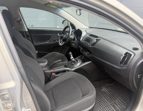 Grey Kia Sportage 2012 in Vilnius, with an engine capacity of 1.70 L and mileage of 317 thousand km for 5650 €, photo 10 on AUTOMOTO.COM.LV