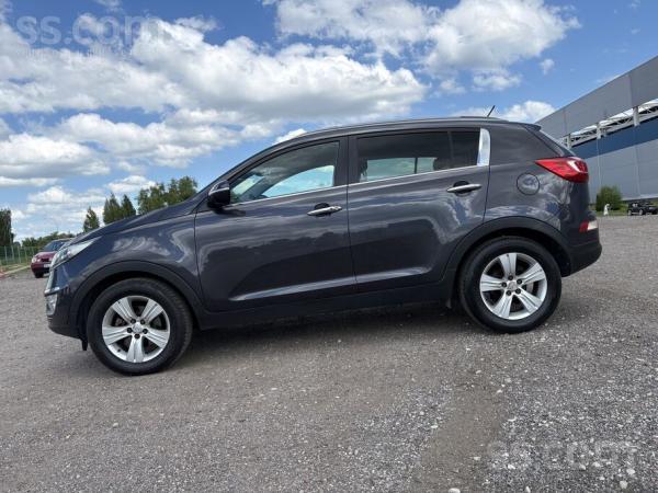 Grey Kia Sportage 2012 in Daugavpils, with an engine capacity of 1.70 L and mileage of 265 thousand km for 7350 €, photo 2 on AUTOMOTO.COM.LV