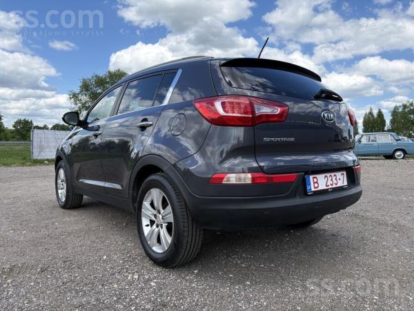 Grey Kia Sportage 2012 in Daugavpils, with an engine capacity of 1.70 L and mileage of 265 thousand km for 7350 €, photo 3 on AUTOMOTO.COM.LV