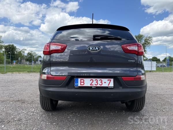 Grey Kia Sportage 2012 in Daugavpils, with an engine capacity of 1.70 L and mileage of 265 thousand km for 7350 €, photo 4 on AUTOMOTO.COM.LV