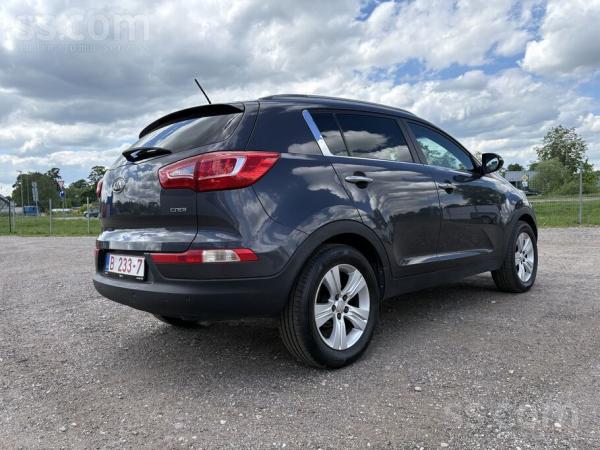 Grey Kia Sportage 2012 in Daugavpils, with an engine capacity of 1.70 L and mileage of 265 thousand km for 7350 €, photo 5 on AUTOMOTO.COM.LV